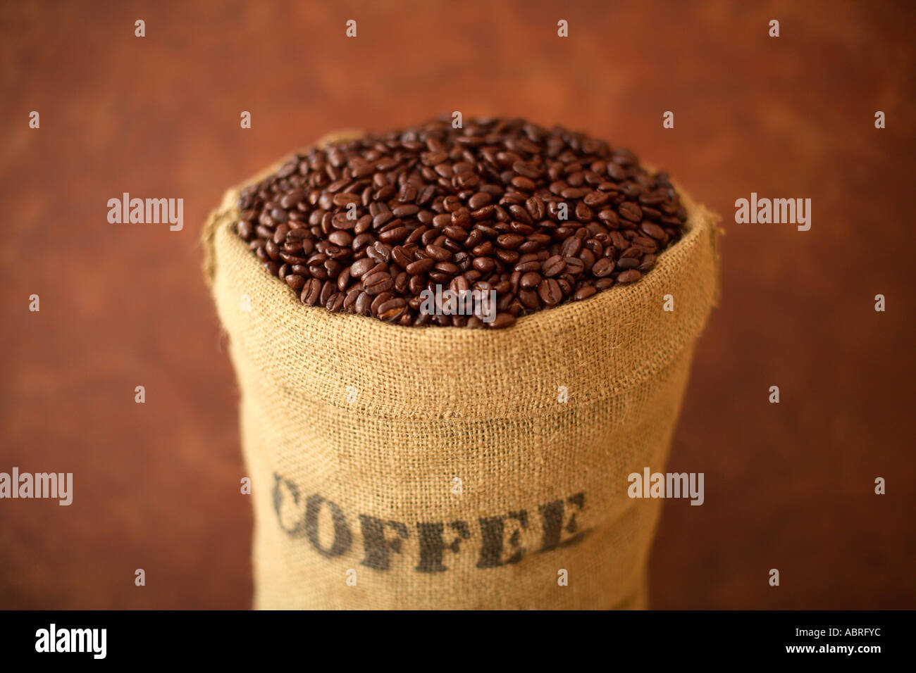 Burlap sack of coffee beans Stock Photo - Alamy