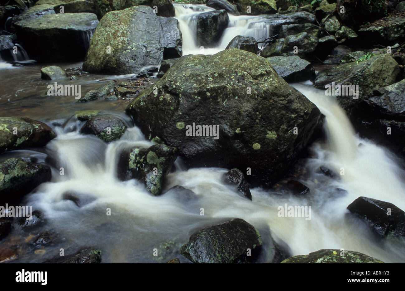 Water running over rocks Stock Photo - Alamy