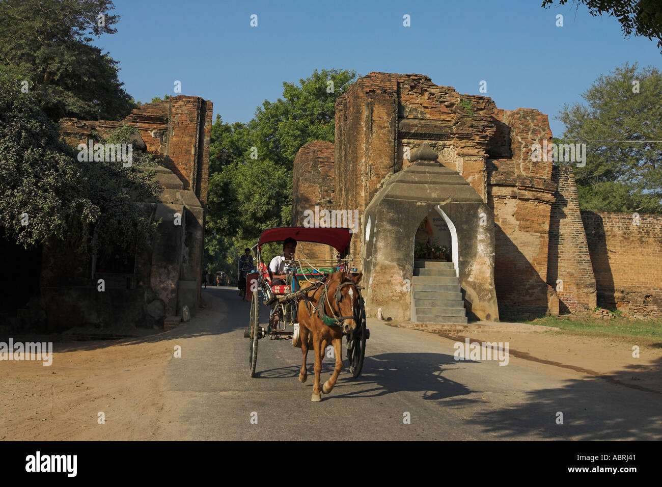 Myanmar Bagan Old Bagan Horse and cart going through Sarabha Gateway ...