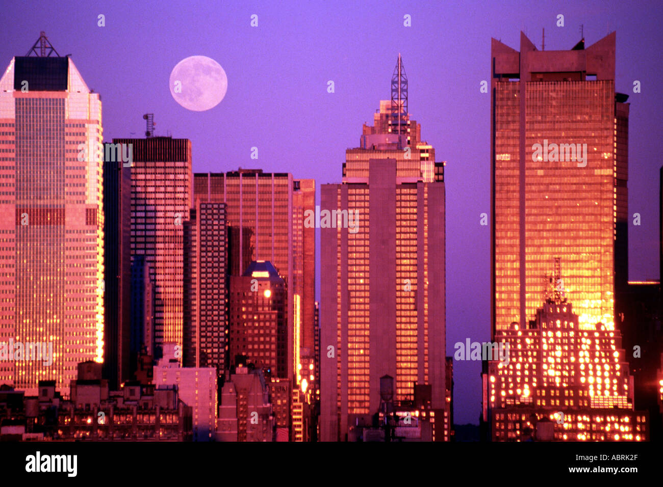 Moon Rise Over Manhattan Stock Photo - Alamy