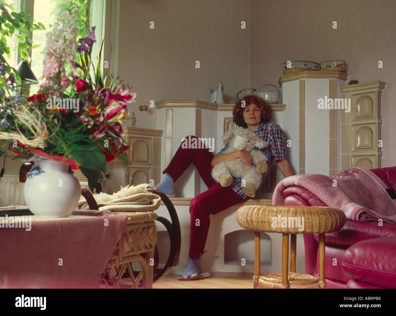 Sitting by the fireside Stock Photo - Alamy