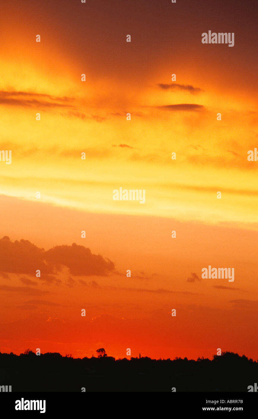 Sunset over landscape Africa Stock Photo - Alamy