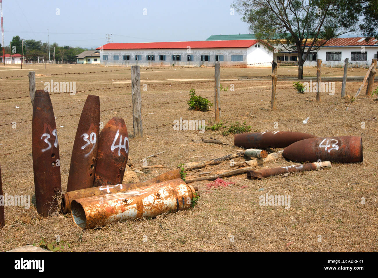 Diffused bombs lie in a school yard in Xepon,Ho Chi Minh trail, Laos ...