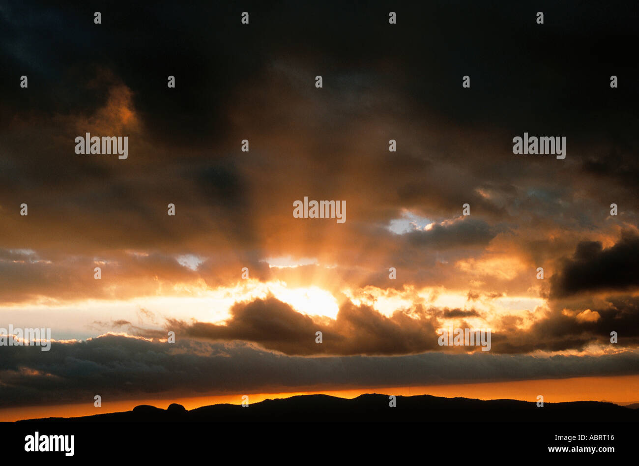 Sun rays shinning through clouds Western Cape South Africa Stock Photo ...