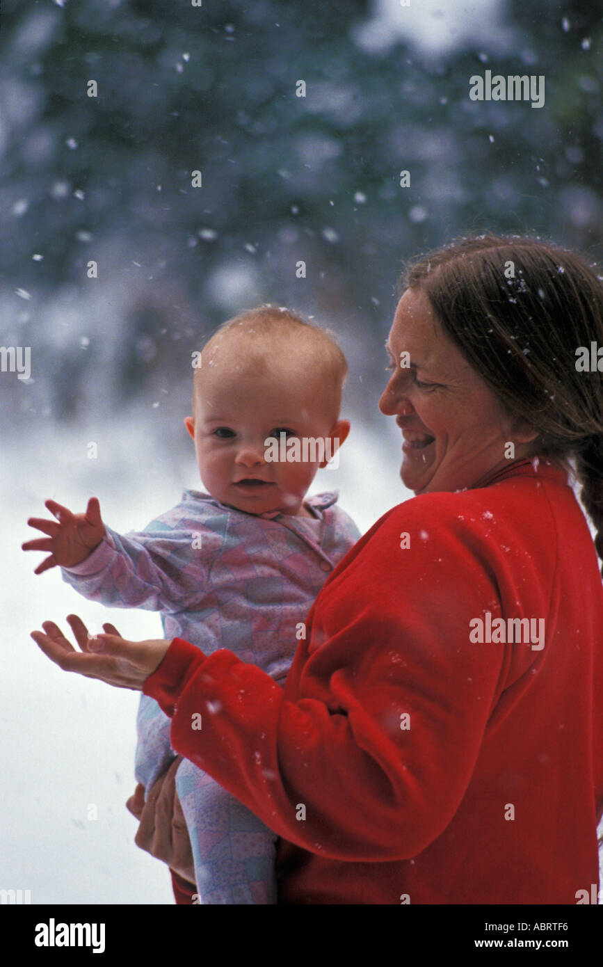 Charlevoix Michigan Amy Good and her daughter Anne examine falling ...