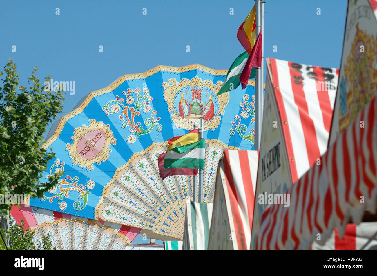 Giant fans decorating the entrance gate to the April Fair Seville ...