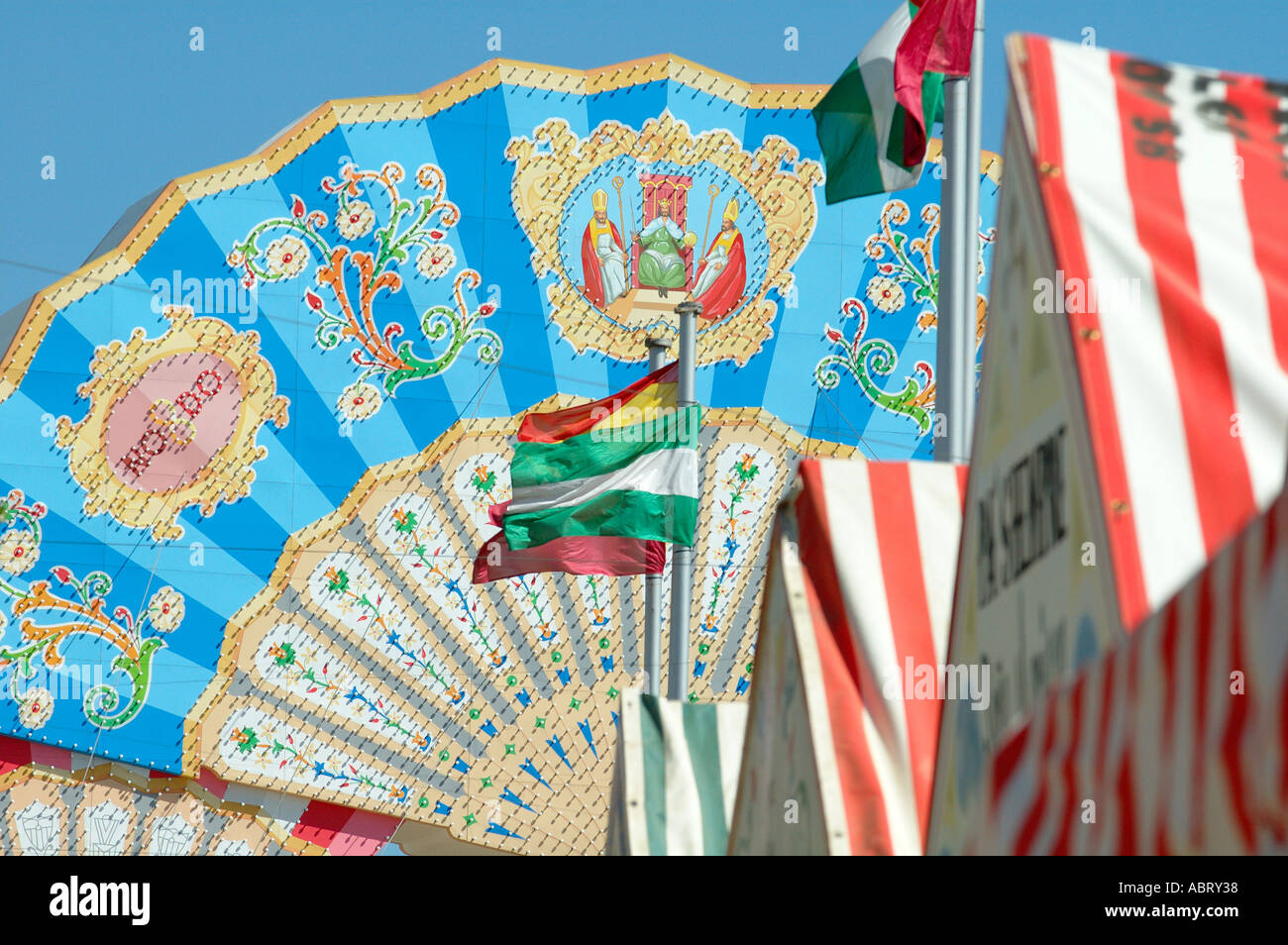 Giant fans decorating the entrance gate to the April Fair Seville ...
