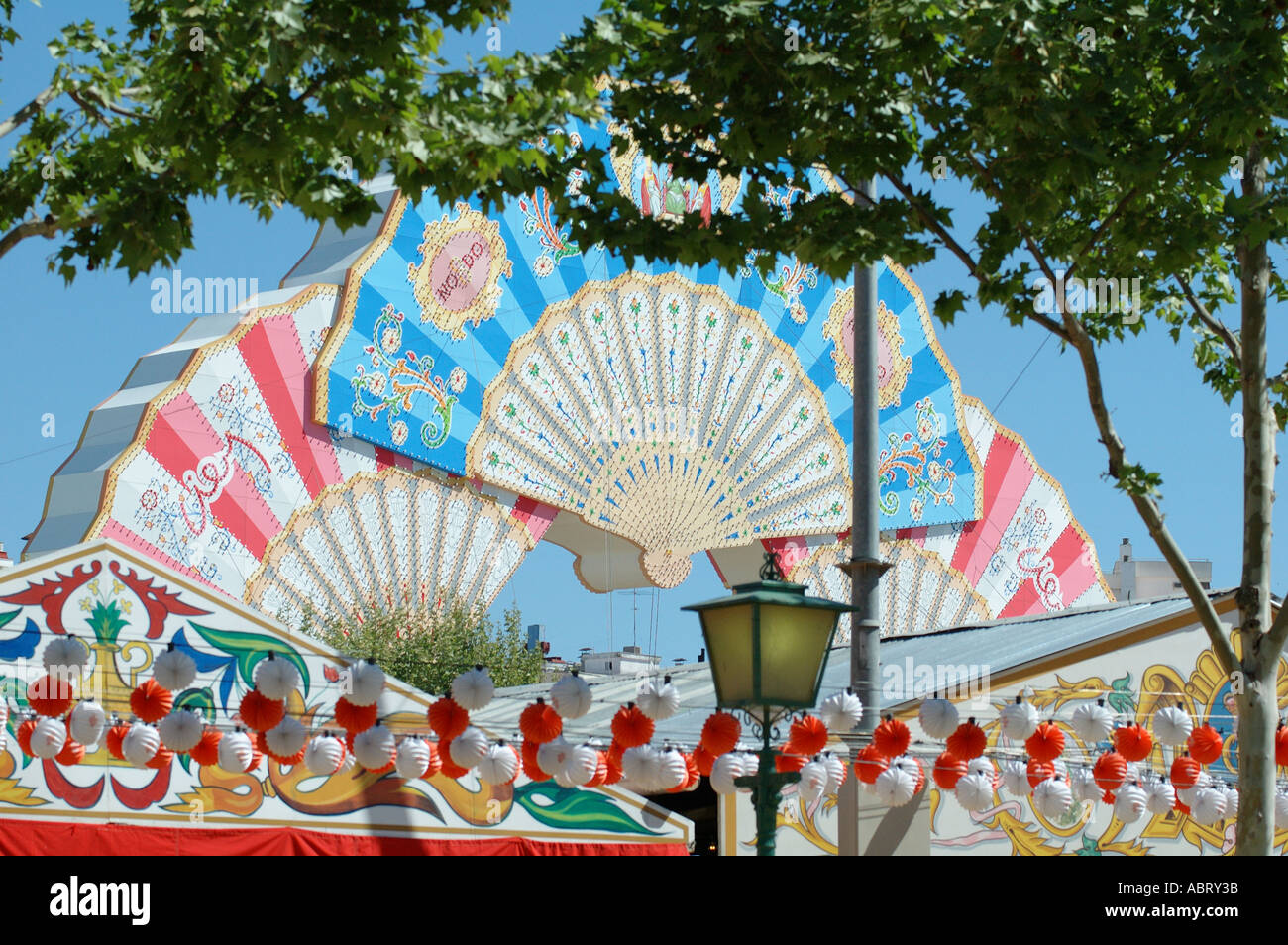 Giant fans decorating the entrance gate to the April Fair Seville ...