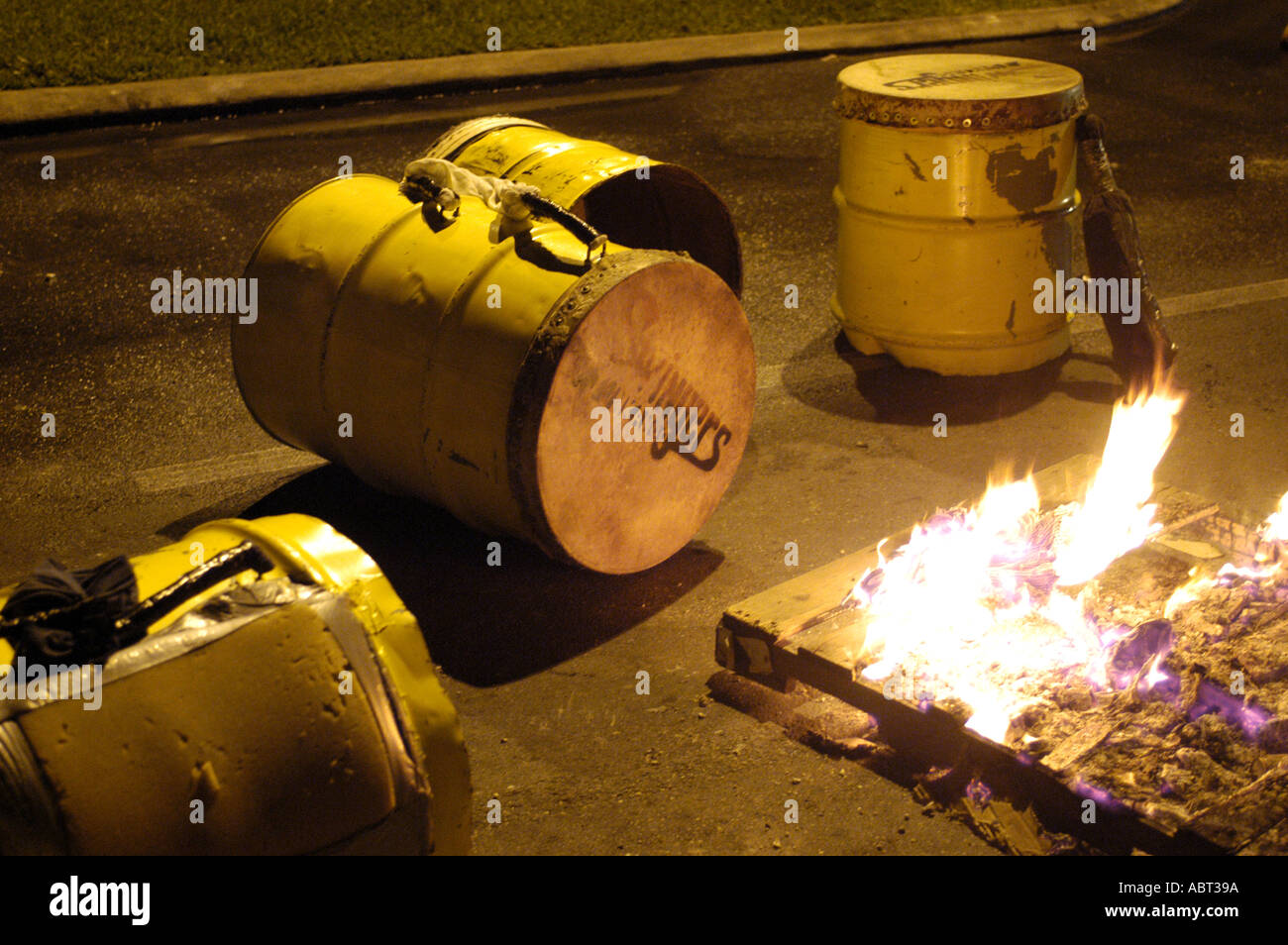 BAHAMAS Junkanoo Celebration Tightening Cowskin Drums with Fire Stock ...