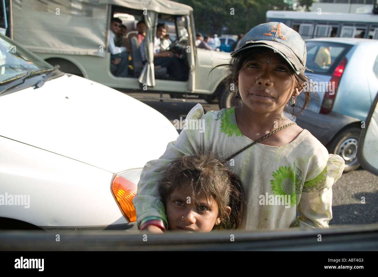 Street children begging at the car window Delhi India Stock Photo - Alamy