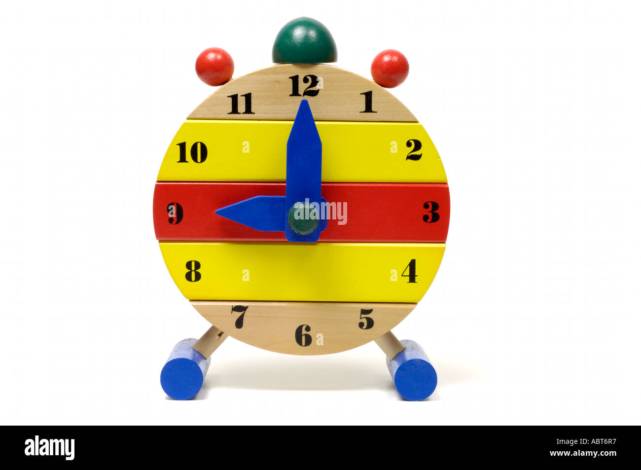 Colourful toy 9 O clock Stock Photo - Alamy
