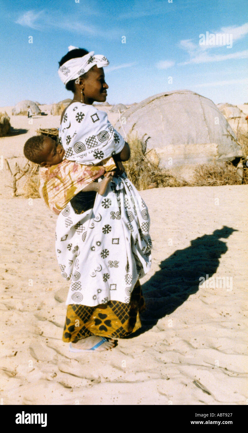 Mali Mother In Traditional Dress With Baby On Back Stock Photo - Alamy
