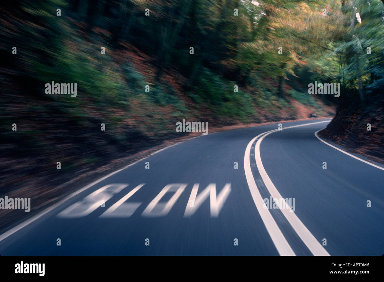 Slow road sign UK Stock Photo - Alamy