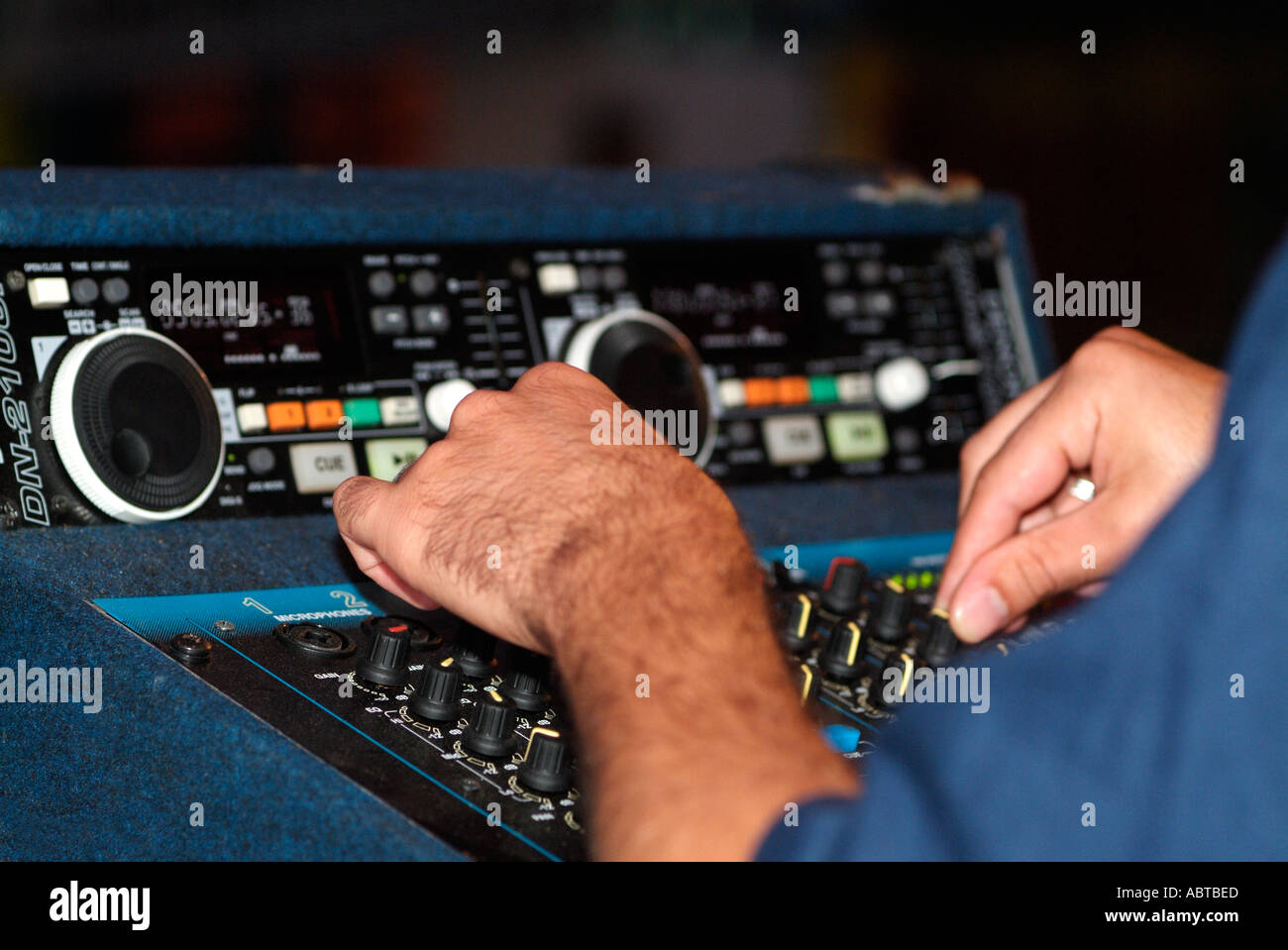 DJ Using an Electronic Mixer, Close Up Stock Photo - Alamy
