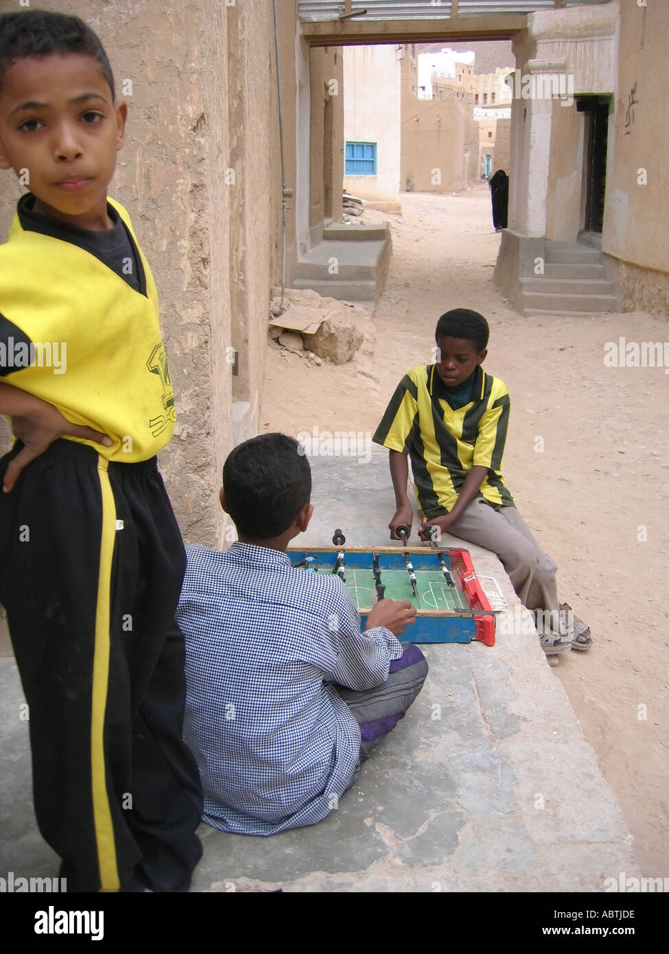Children playing tabletop soccer in the village of Seef in Wadi Do an ...