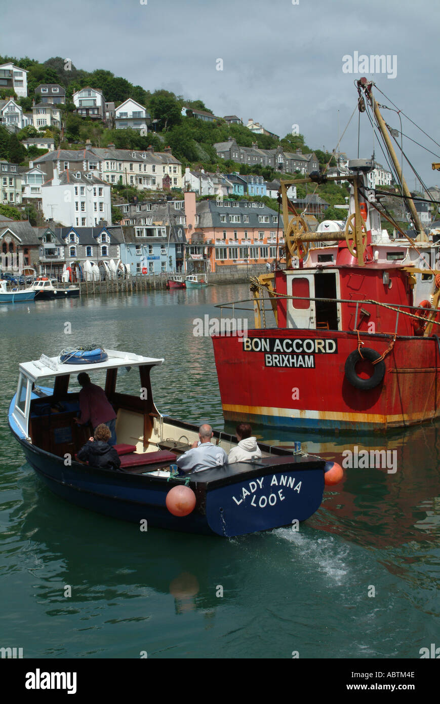 The Fishing Harbour Town of West Looe with Trawler and Small Ferry Boat ...