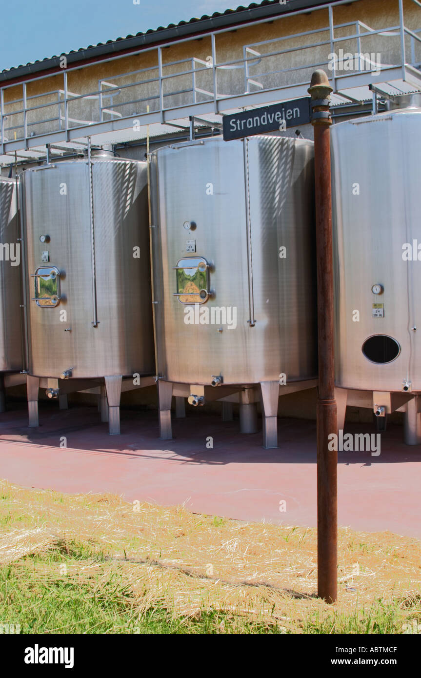 Outside stainless steel fermentation tanks and a jocular street sign ...