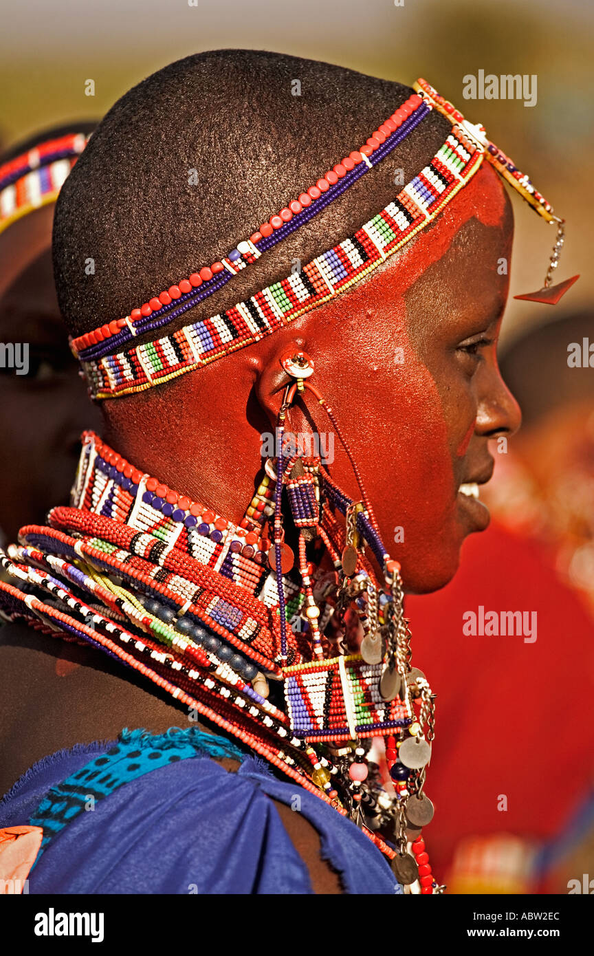 Maasai girl Unmarried girls with their beaded necklaces and colourful ...