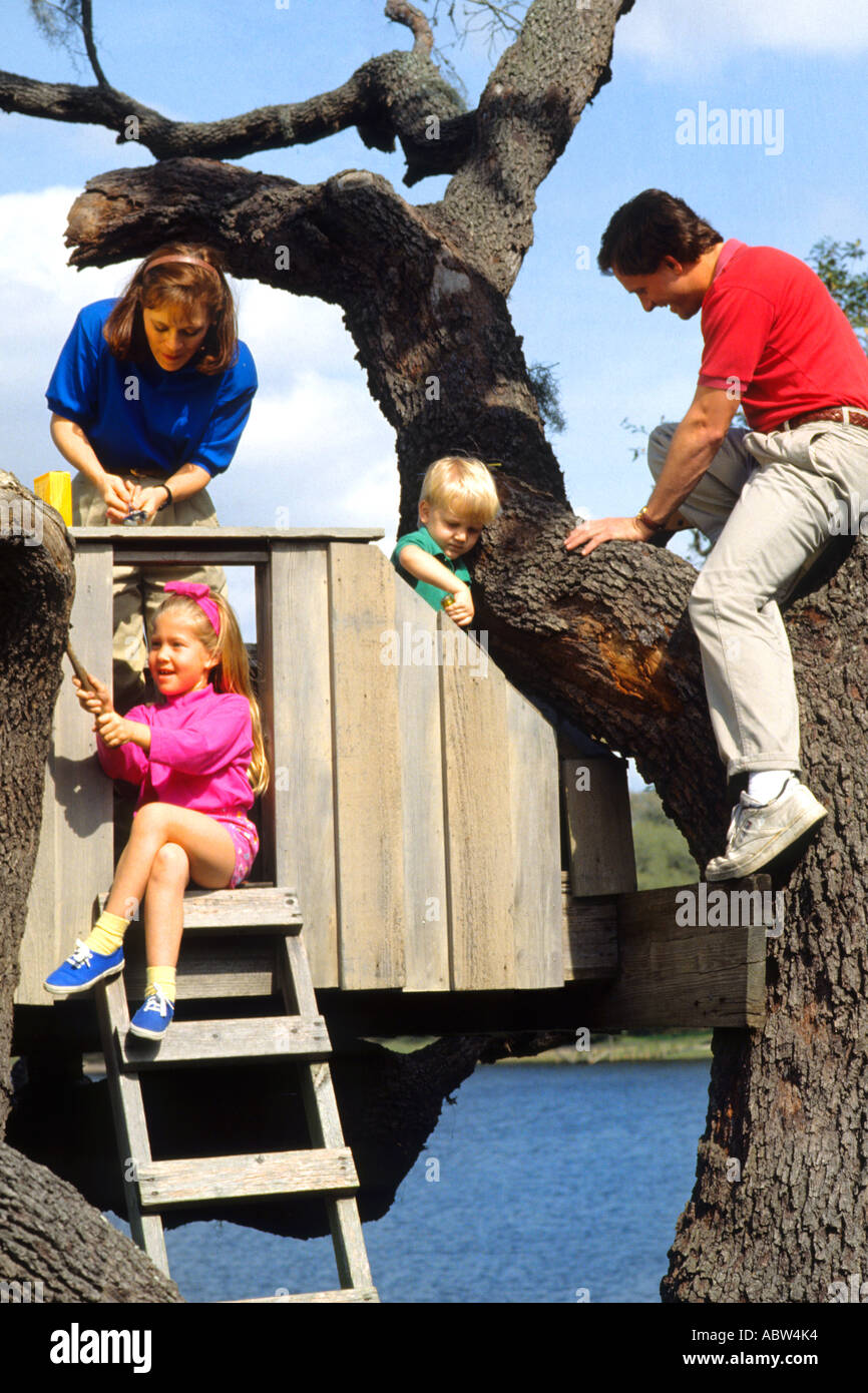 Family building treehouse High Resolution Stock Photography and Images ...