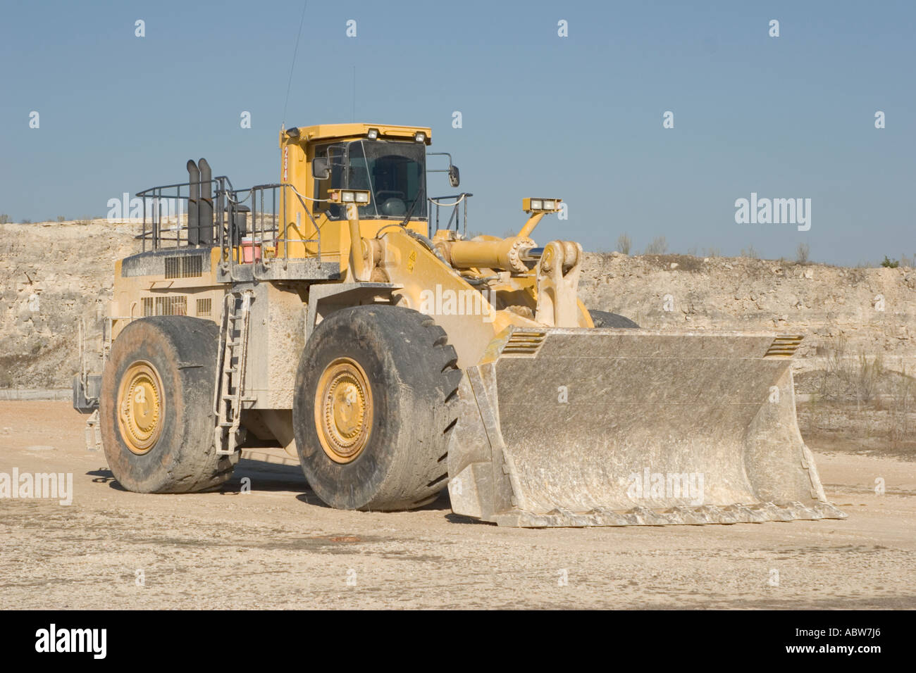 Wheeled bucket loader heavy equipment used to load rock to be crushed ...
