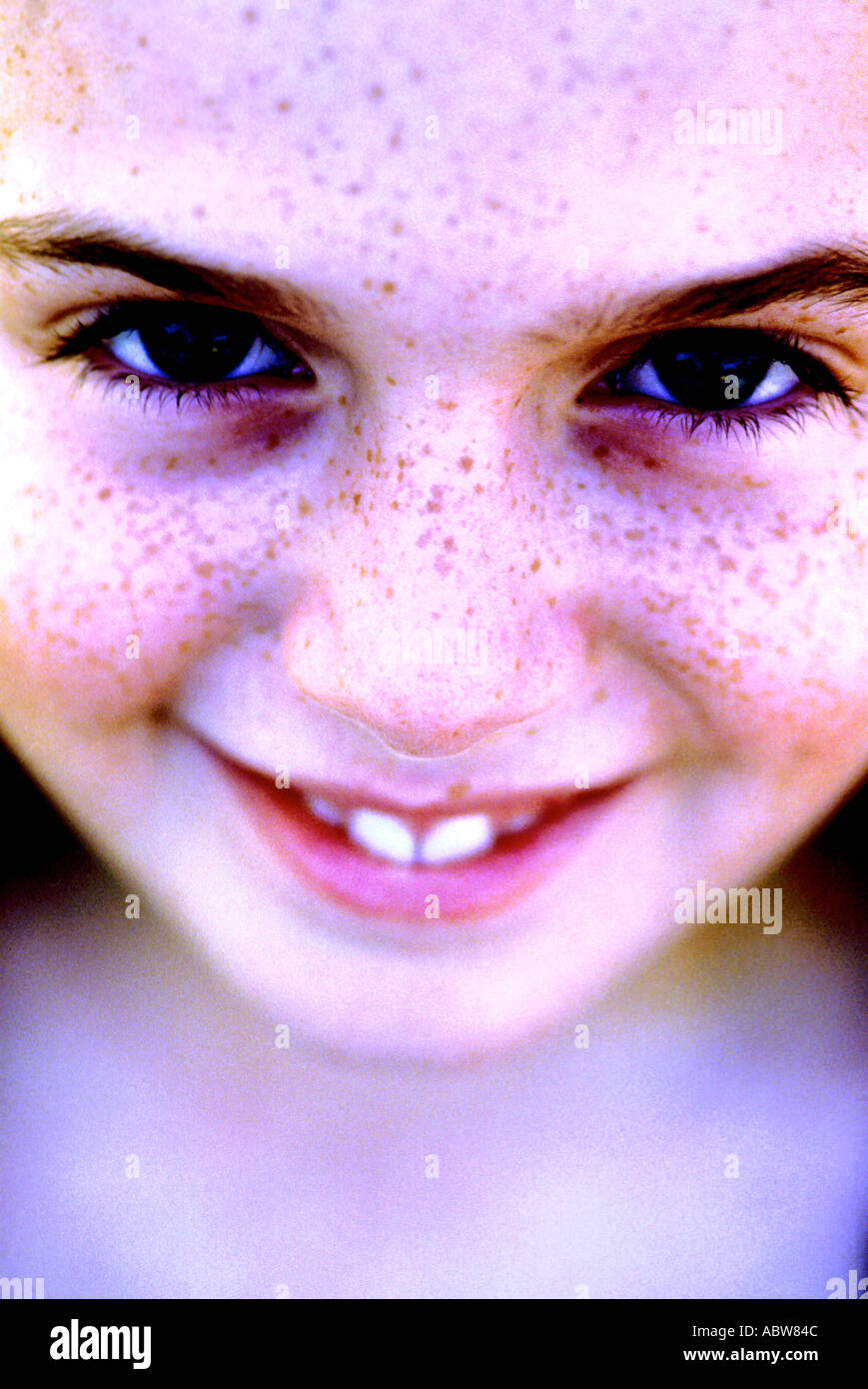 portrait young girl looking at camera Stock Photo - Alamy