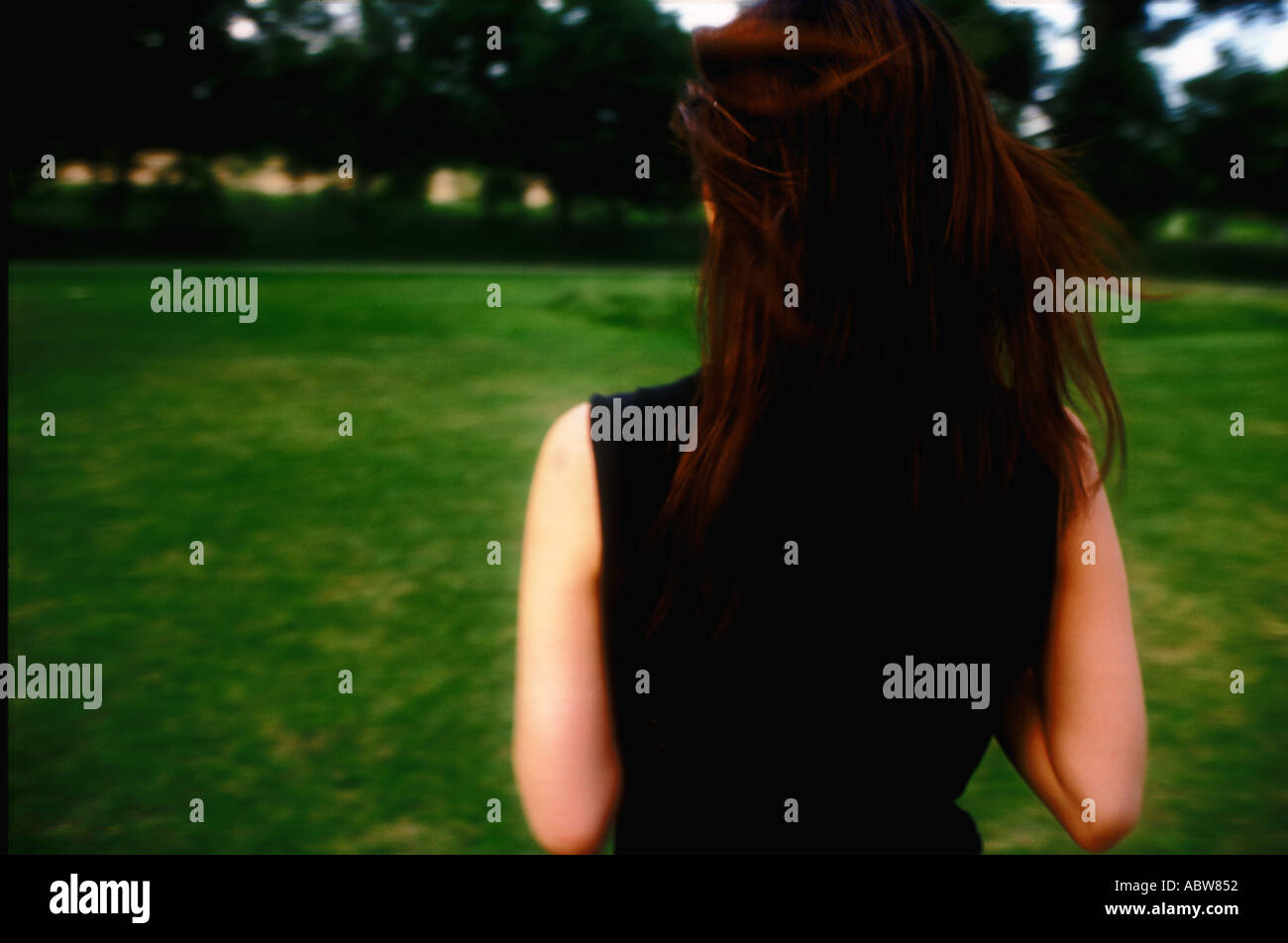 Portrait female seen from back Stock Photo - Alamy