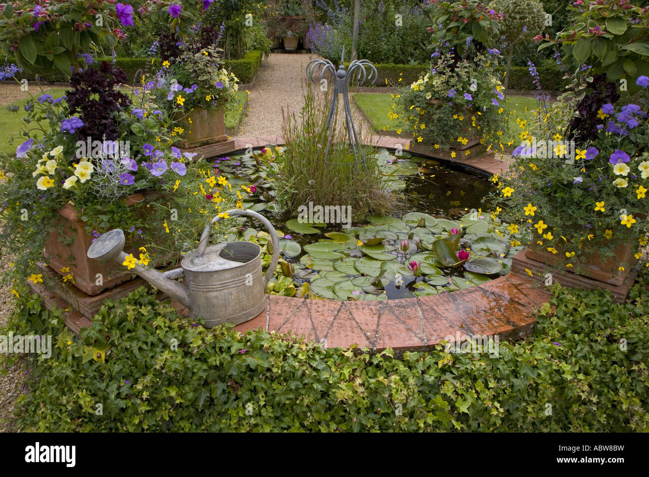 Watering can water feature hi-res stock photography and images - Alamy