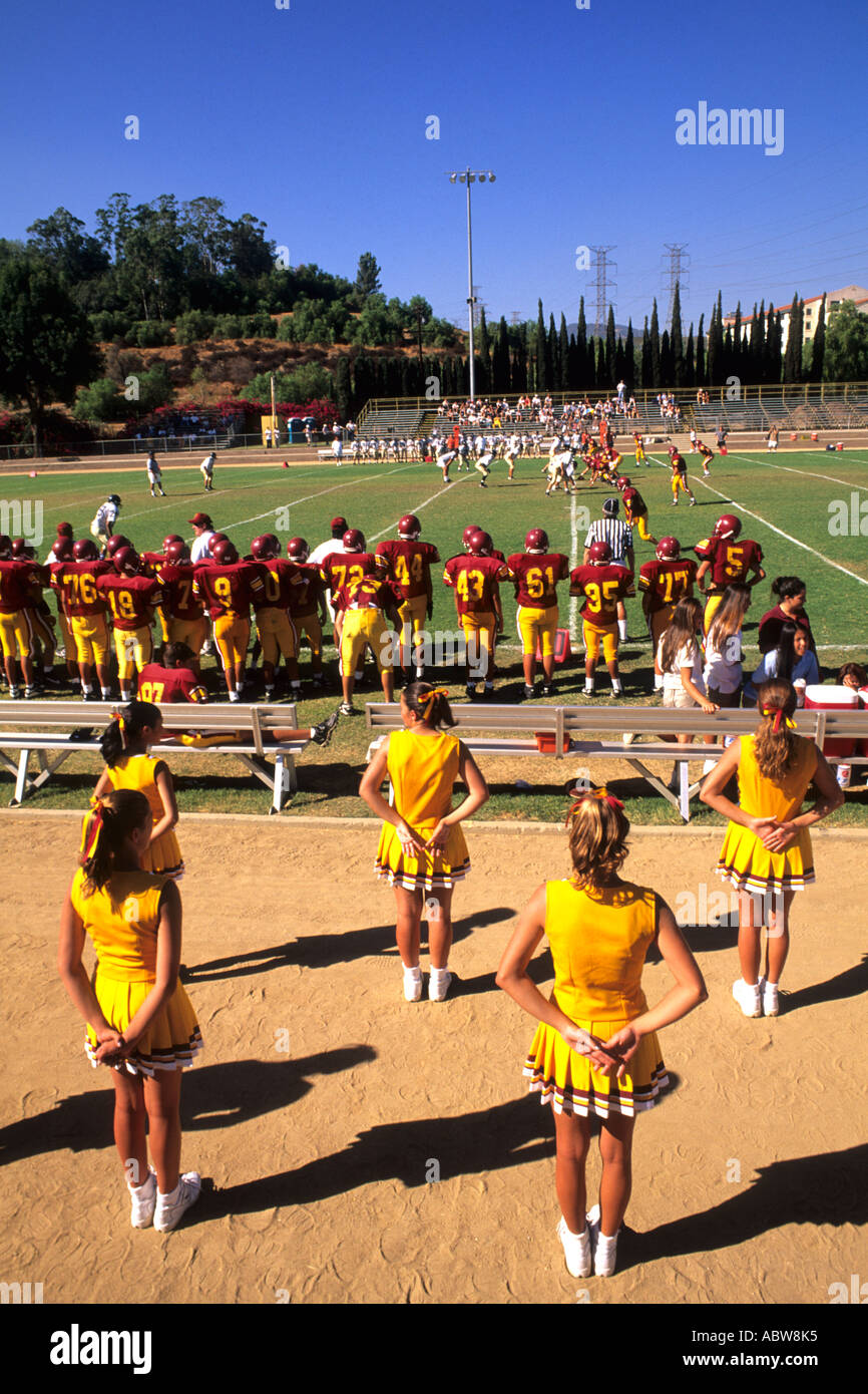 Cheerleaders leading cheer for high school football game in Los Angeles ...