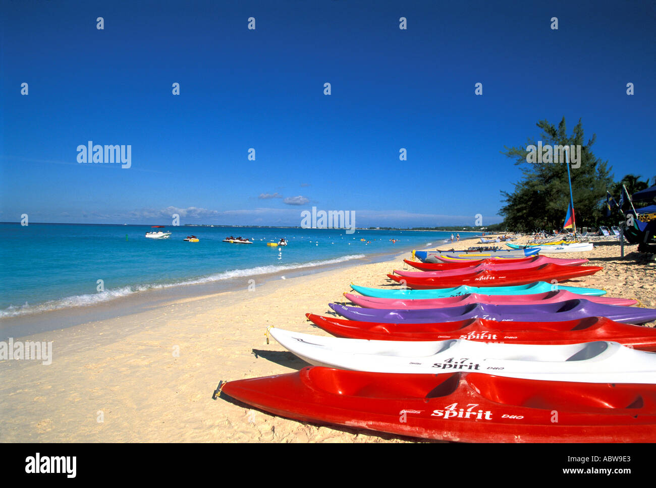 Caribbean Grand Cayman Seven Mile Beach Kayaks in a row Stock Photo - Alamy