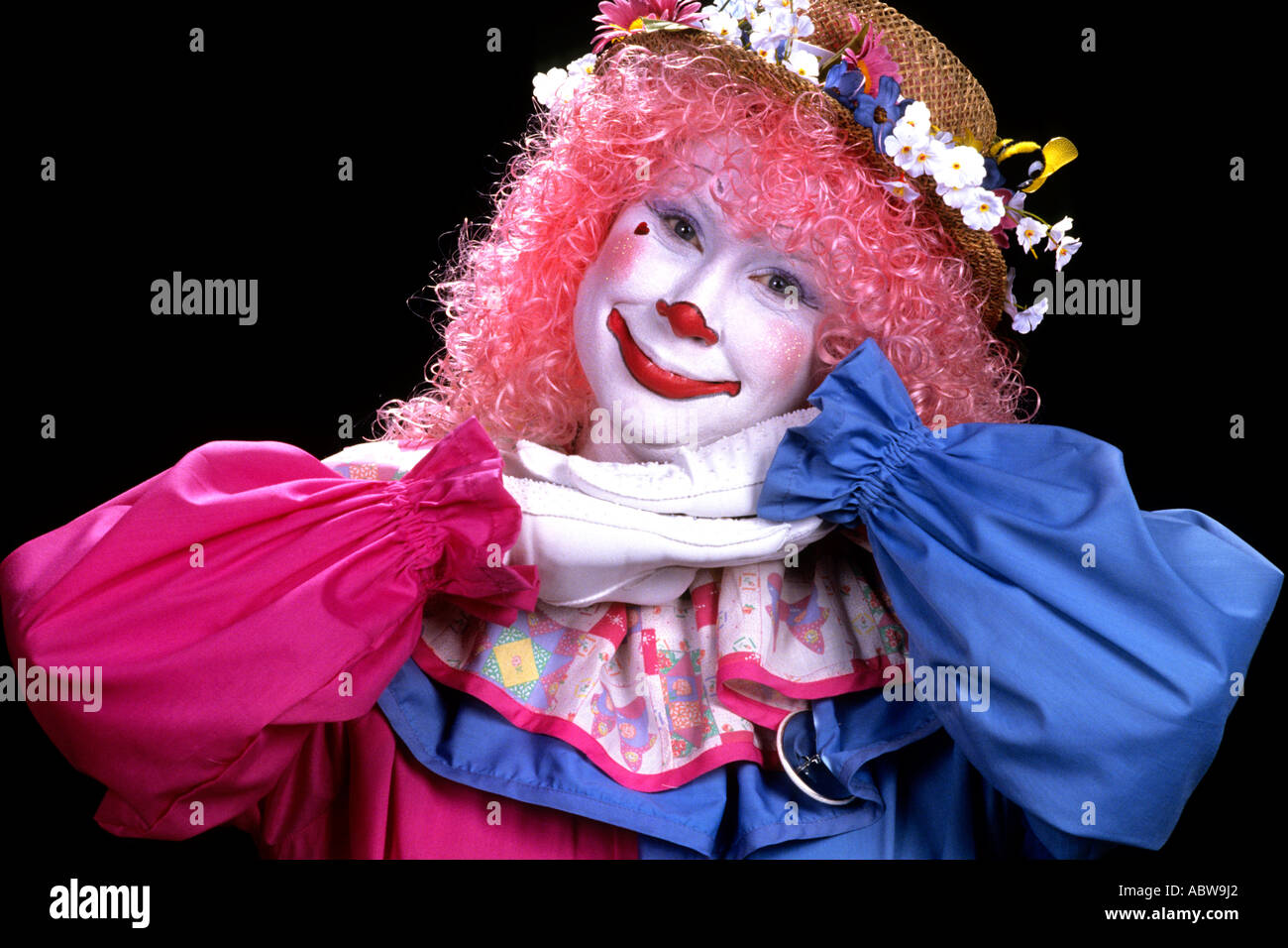Portrait of colorful clowns in makeup for show to be funny for children ...