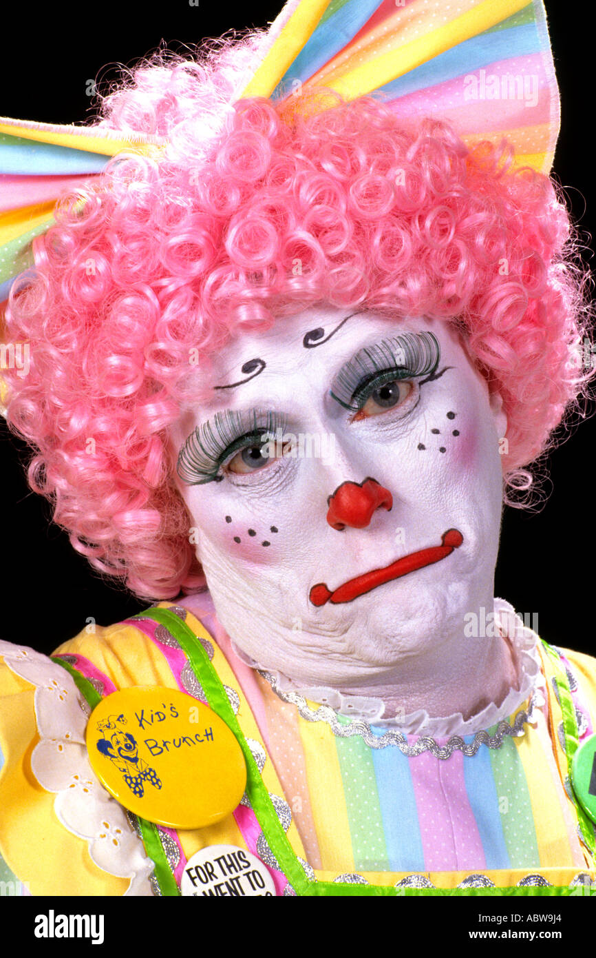 Portrait of colorful clowns in makeup for show to be funny for children ...