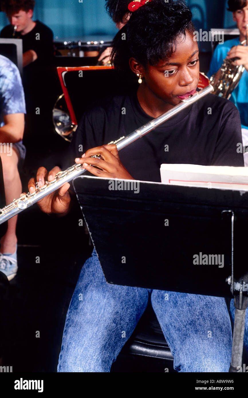 Black african american student practising instrument in high school ...