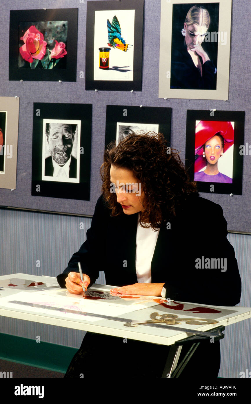 College art student working on art project in advertising class Stock ...