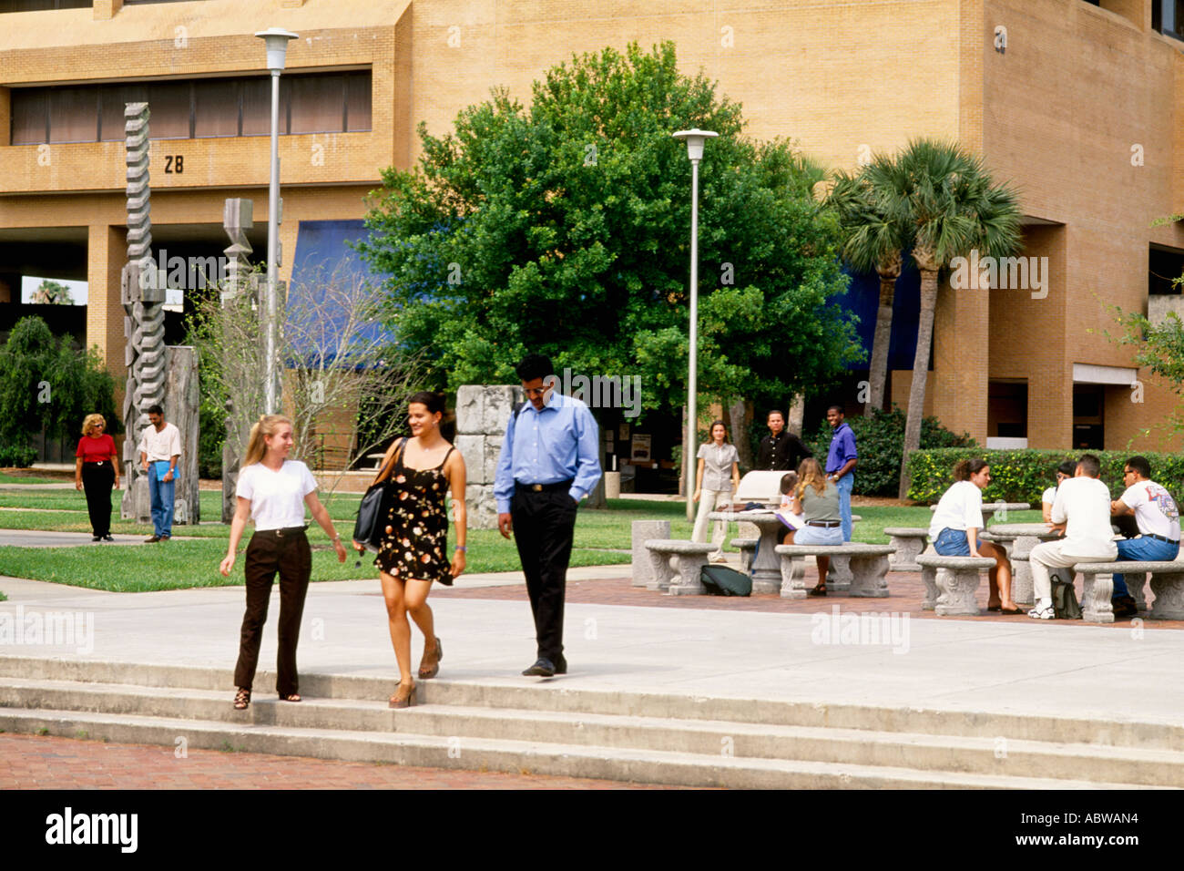 College students walking together towards class on campus Stock Photo ...