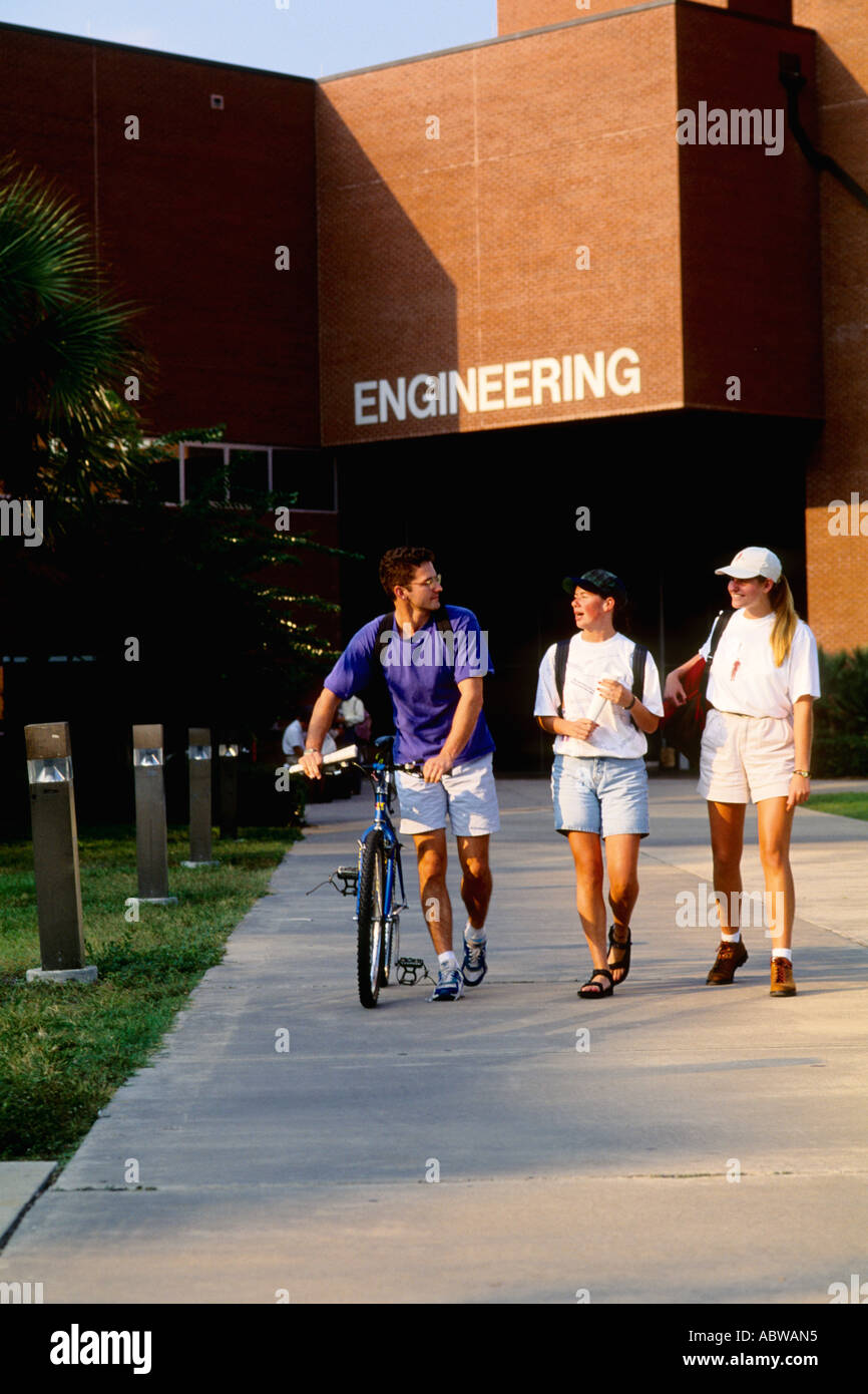 College students walking together towards class on campus Stock Photo ...