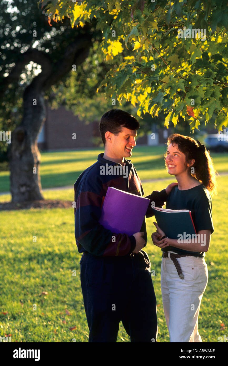 College students outside relaxing before going to class Stock Photo - Alamy