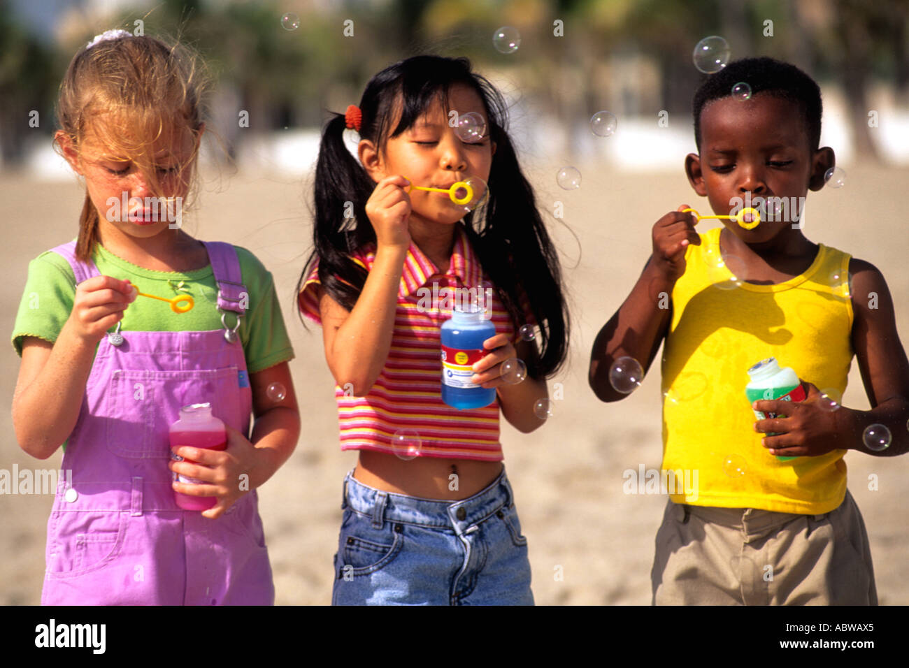 Boy blowing bubbles on white hi-res stock photography and images - Alamy