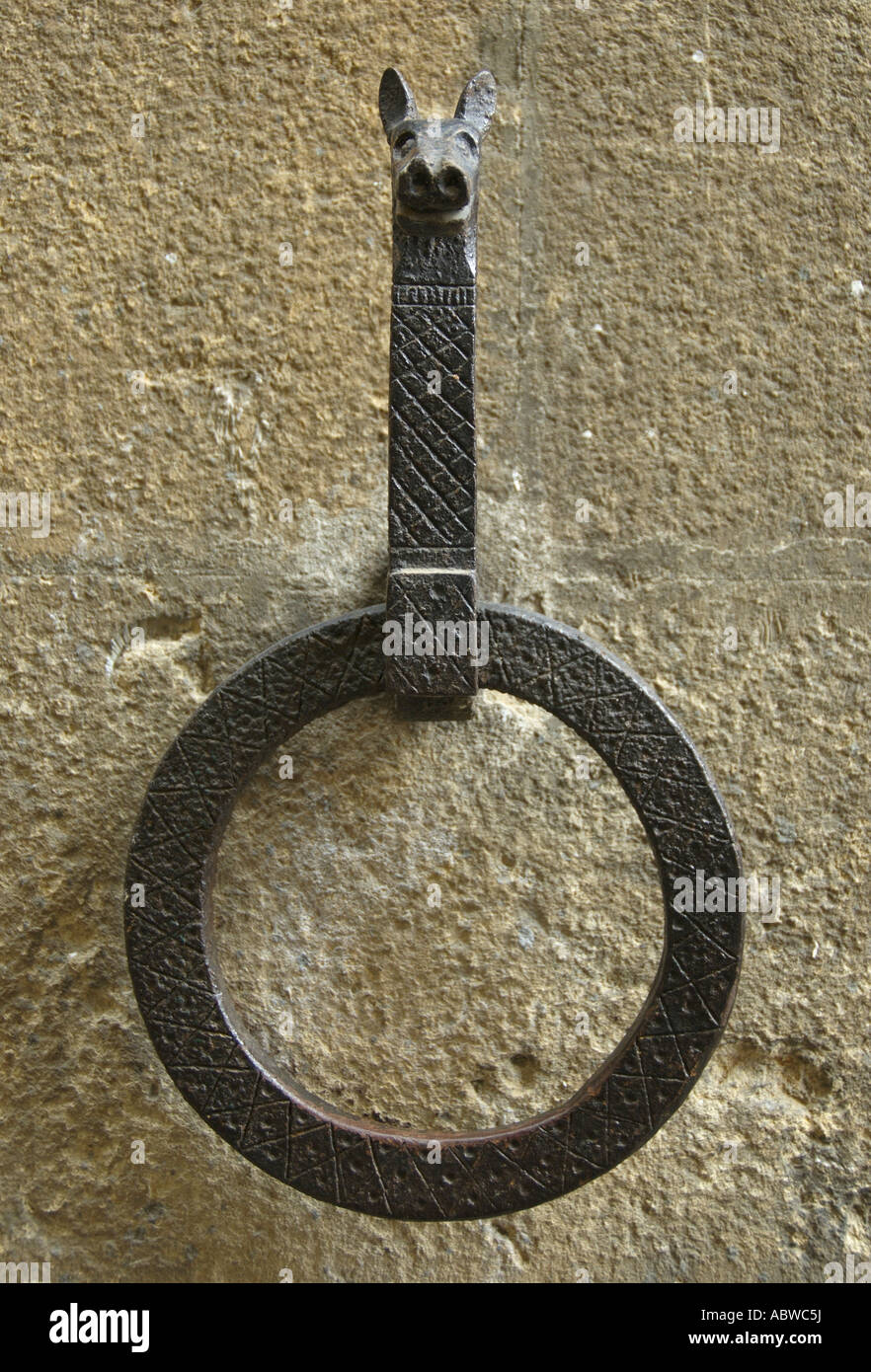 Iron Tethering Ring with equestrian design, Volterra, Italy Stock Photo ...