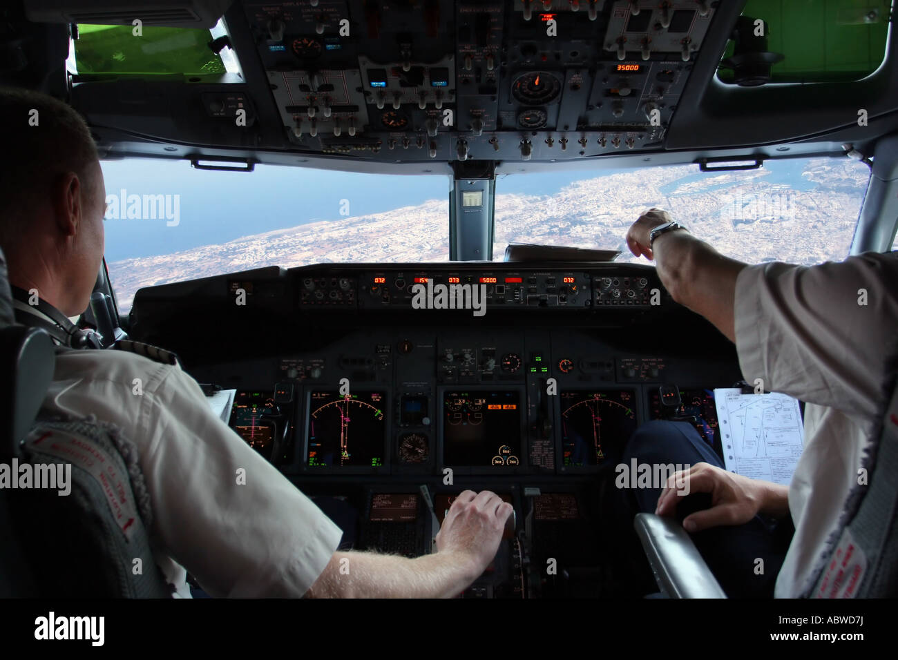 Pilots working in cockpit hi-res stock photography and images - Alamy