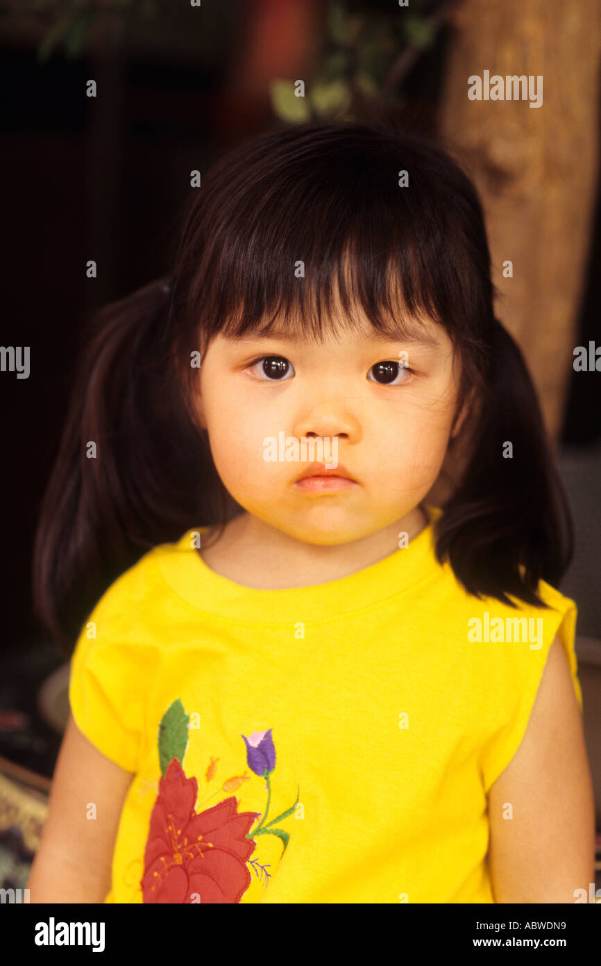 Young girl age 4 portrait in Singapore Stock Photo - Alamy