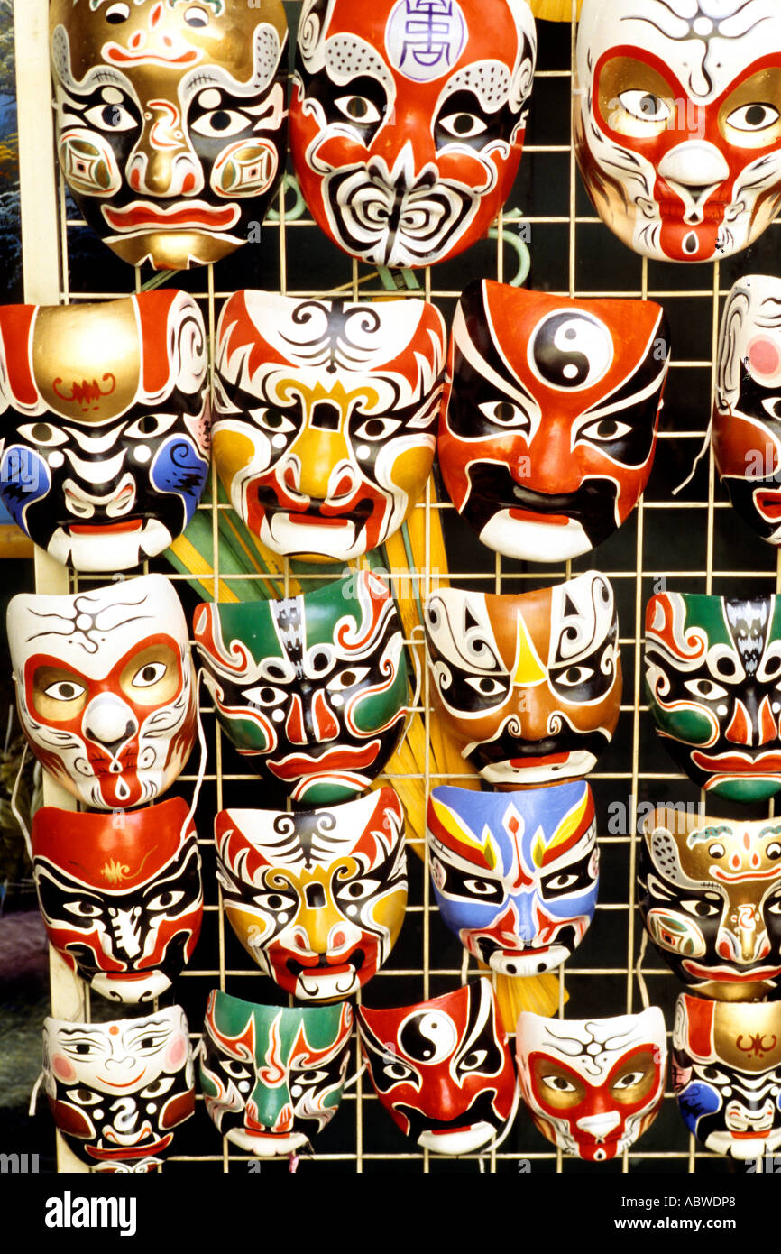 Singapore masks in Chinatown artwork Stock Photo - Alamy