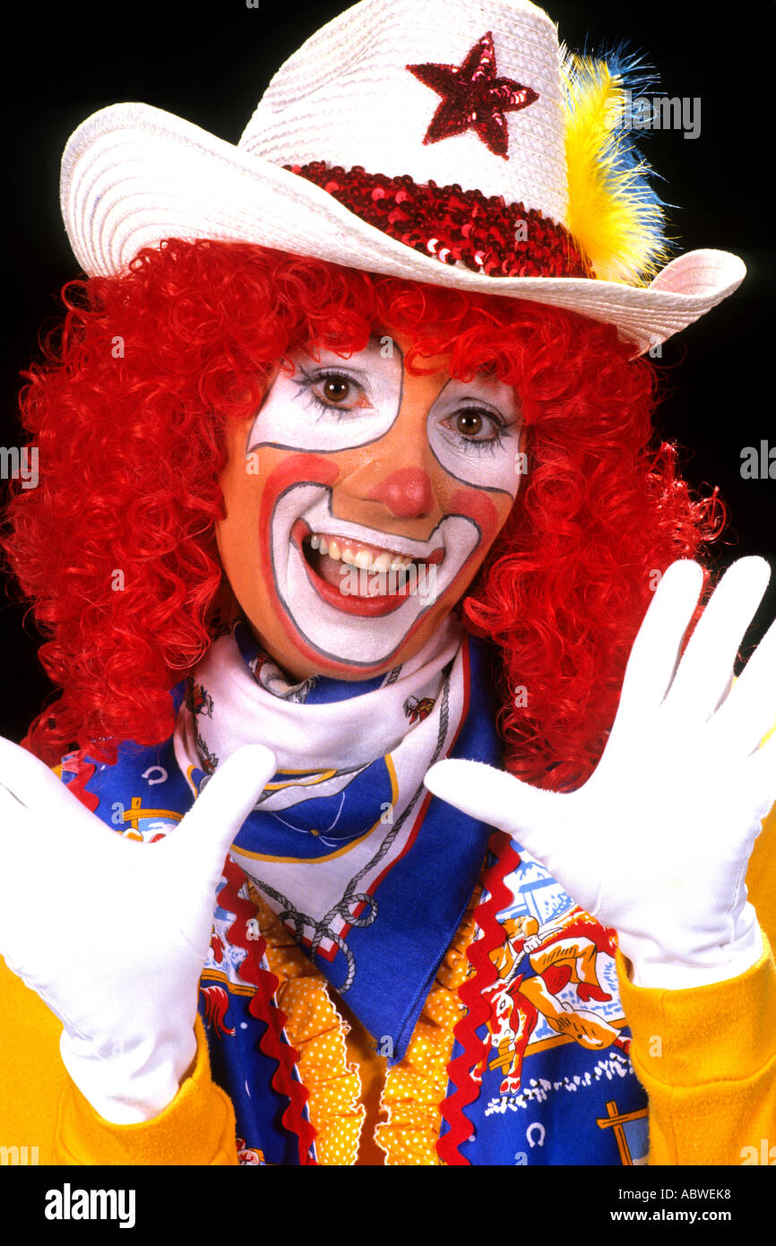 Portrait of colorful clowns in makeup for show to be funny for children ...