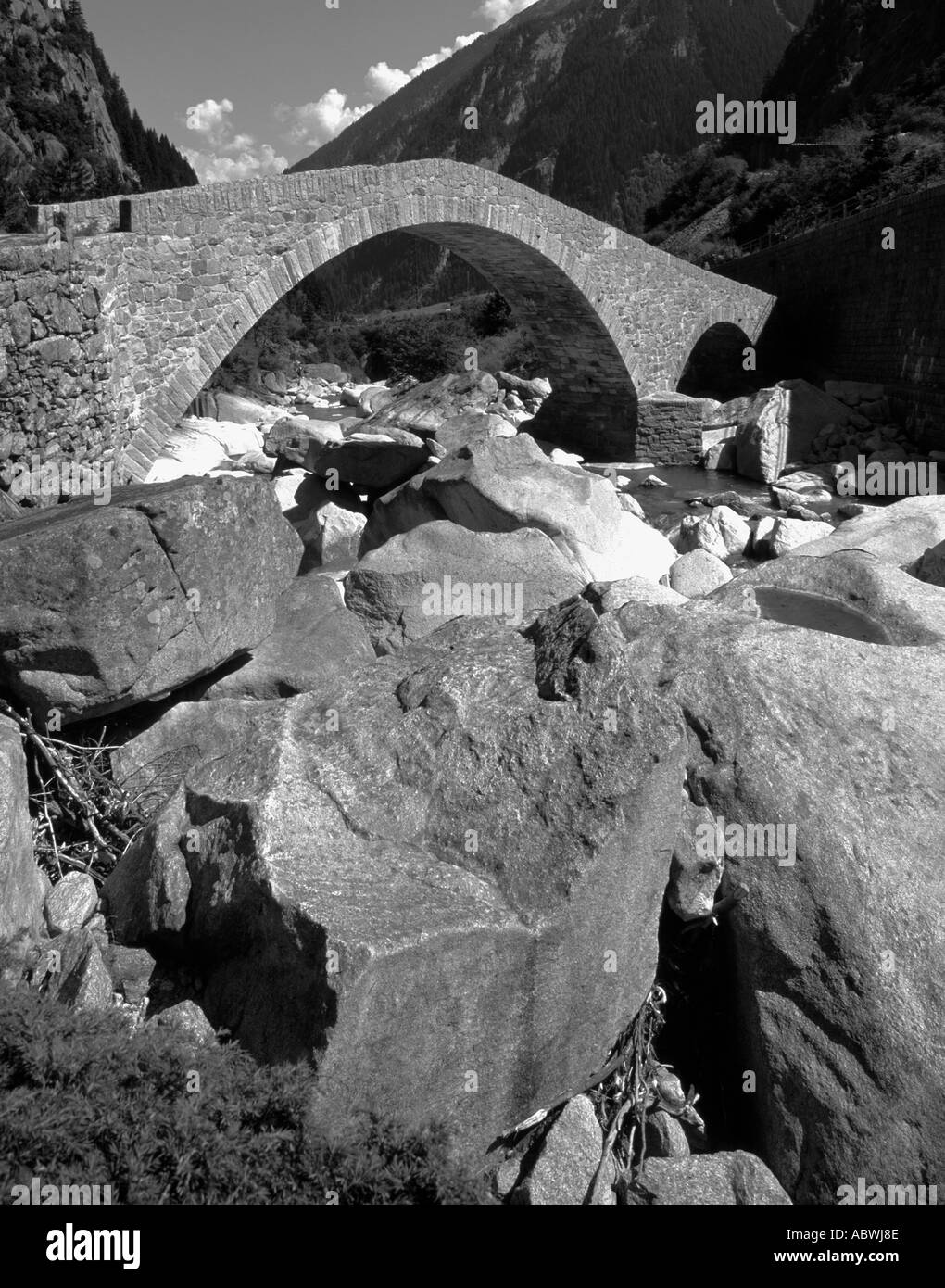Stone bridge in the Swiss mountains alone the St Gotthard route in ...