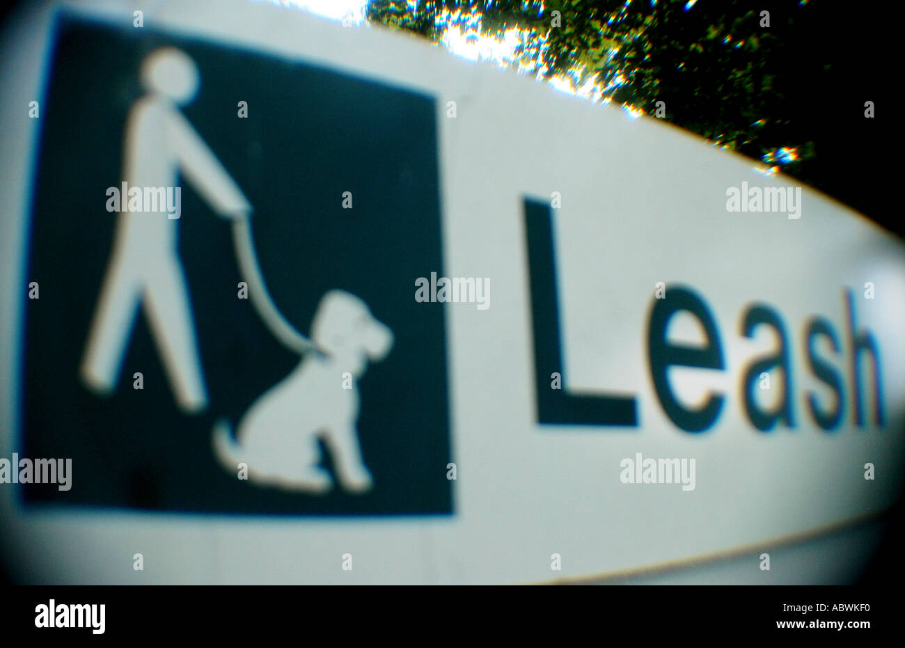 Leash Dog sign Stock Photo - Alamy