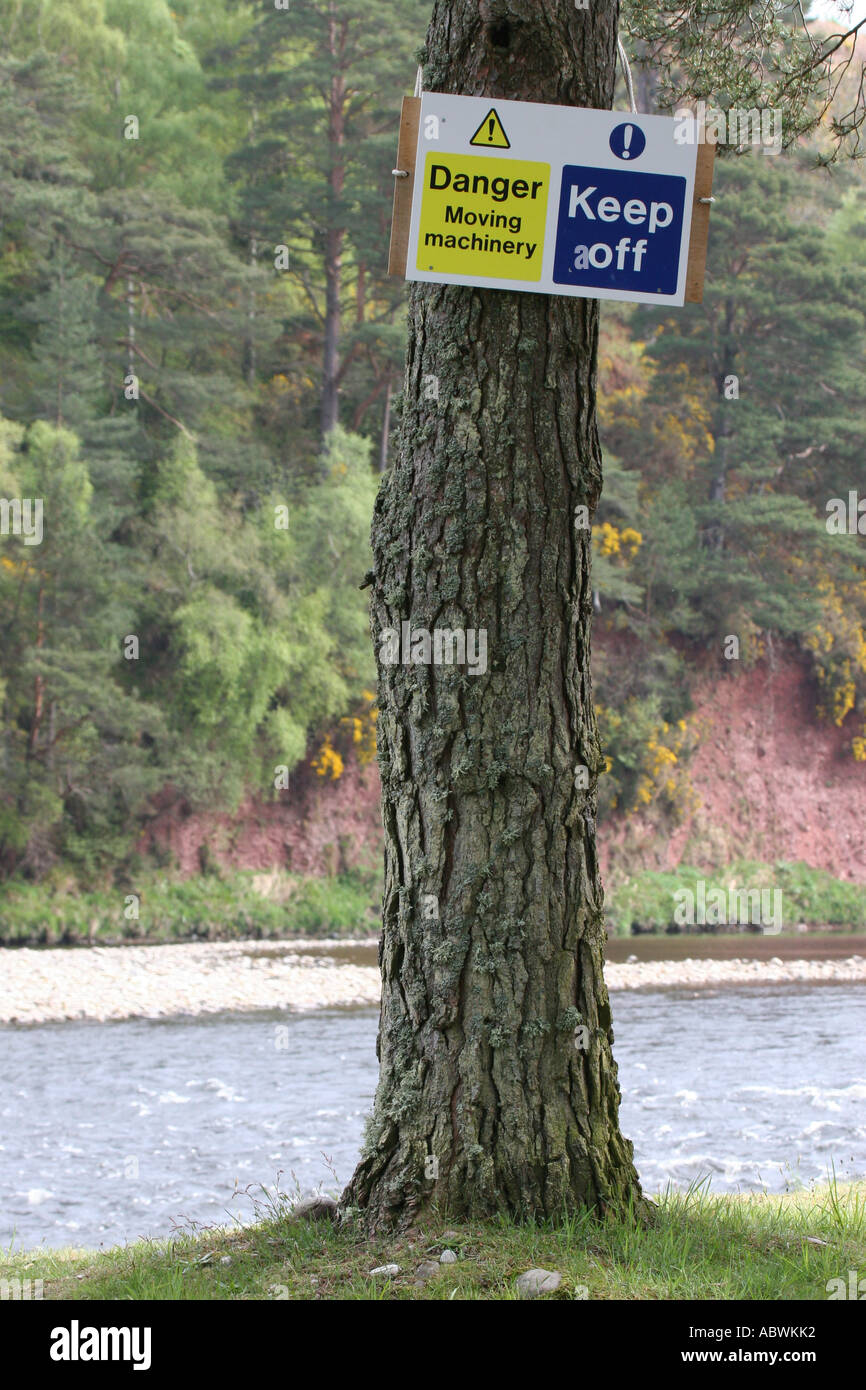 "Warning sign, Danger Moving Machinery, Fixed to a static tree ...