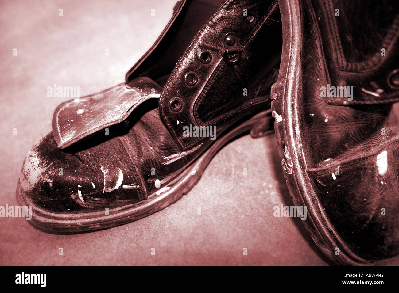A pair of worn out work boots Stock Photo - Alamy