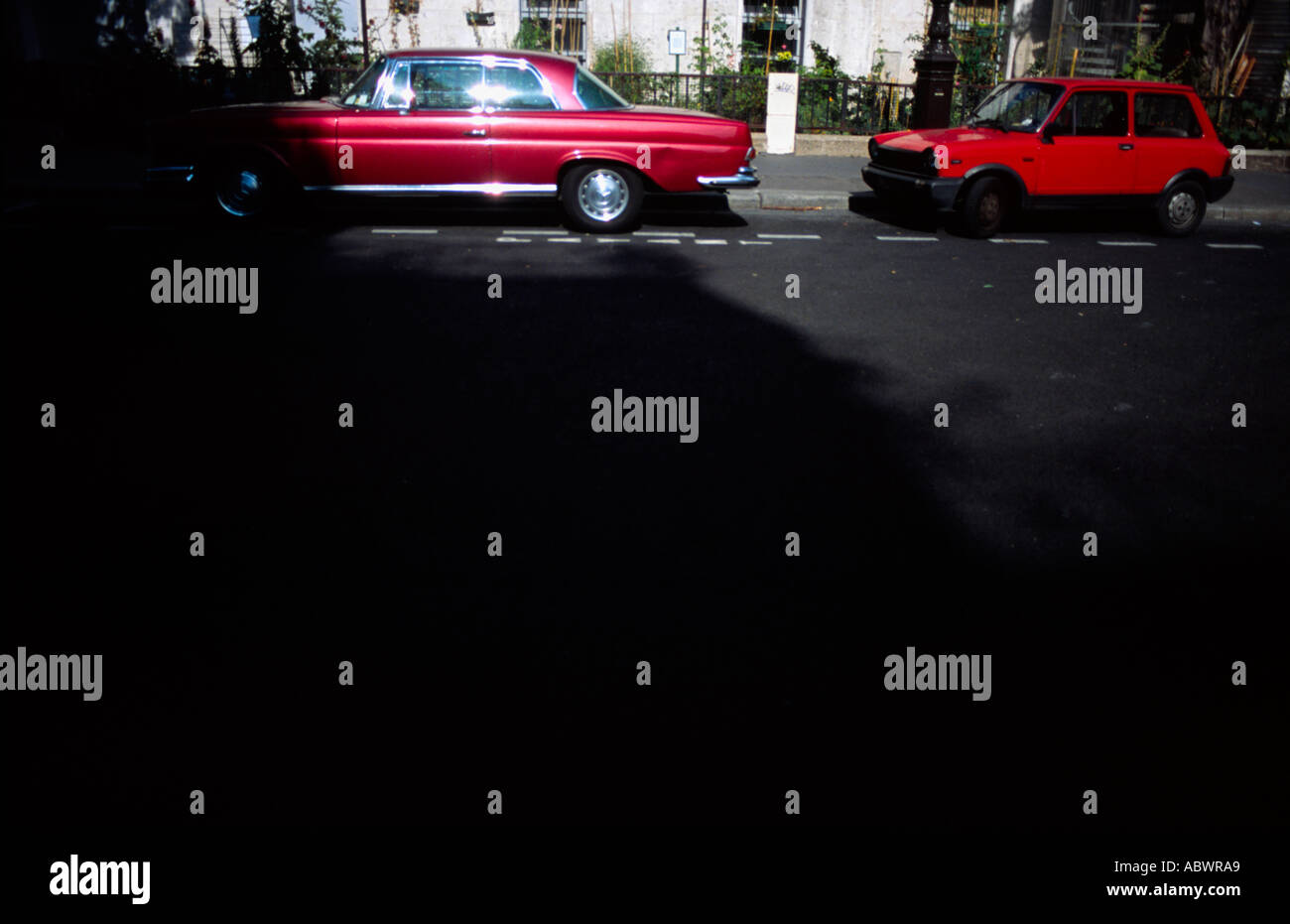 two red cars paris france Stock Photo - Alamy