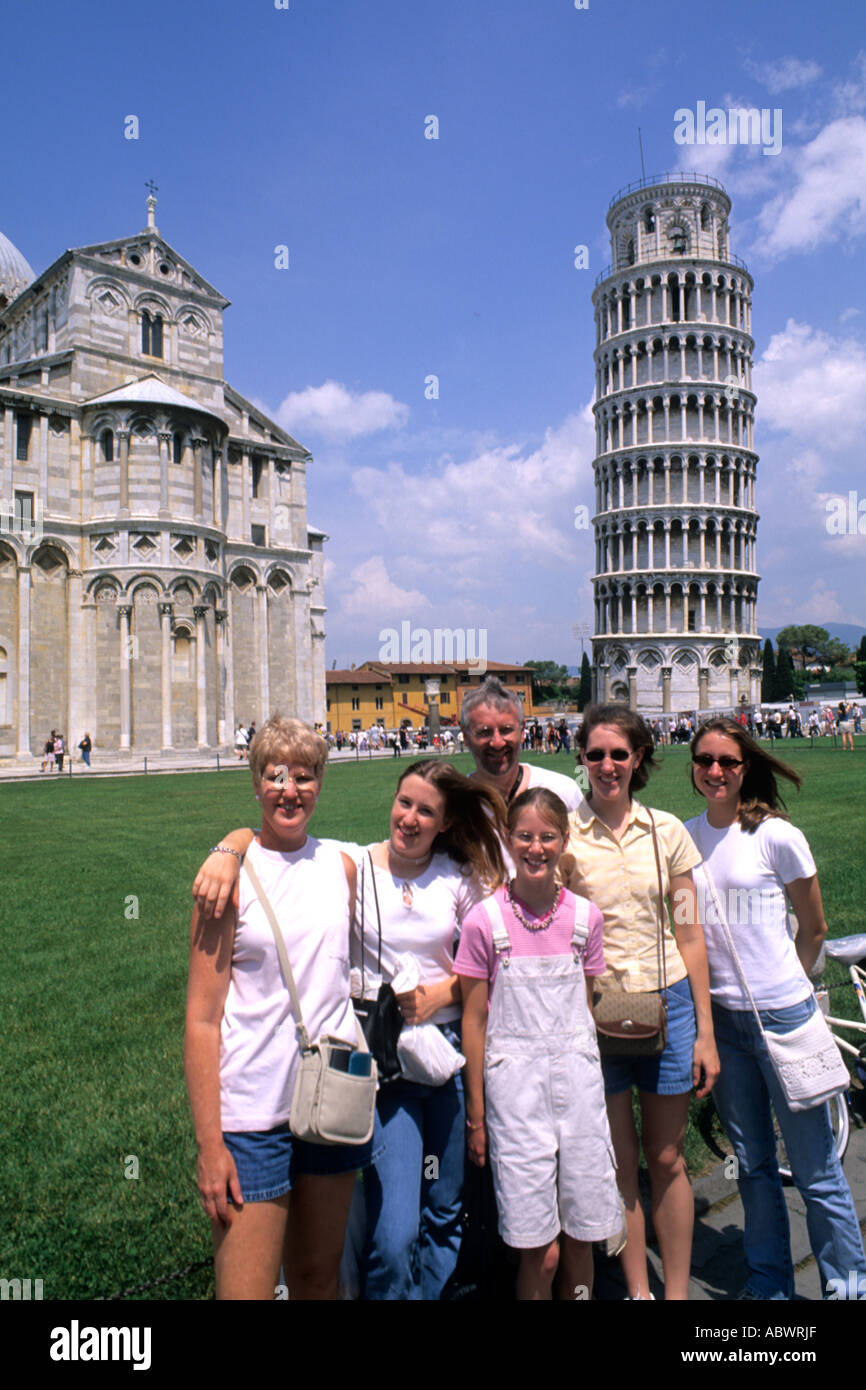 Tourists portrait in front of the famous Leaning Tower of Pisa in Pisa ...
