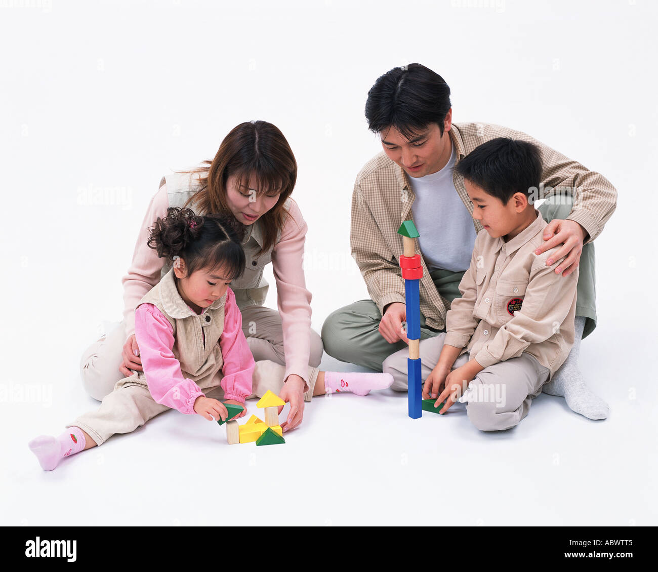 Boy girl playing toys Cut Out Stock Images & Pictures - Alamy