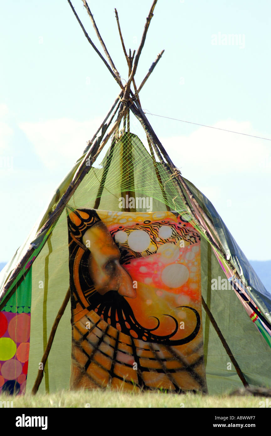 Psychedelic decoration teepee and shaman face at rave party, Slovakia ...